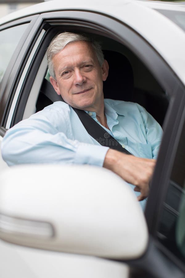 Portrait of Smiling Senior Man Driving Car Stock Image - Image of ...