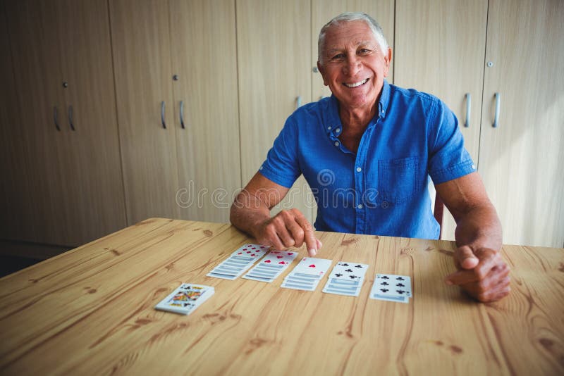 Portrait of Smiling Senior Man Pointing at a Card Stock Image - Image ...