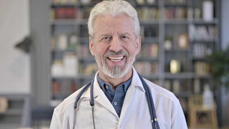 Portrait of Smiling Senior Old Doctor Looking at the Camera Stock Image ...