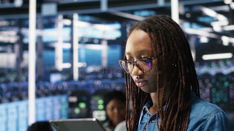 Portrait of Smiling Server Room Engineer Using Device To Interpret AI ...