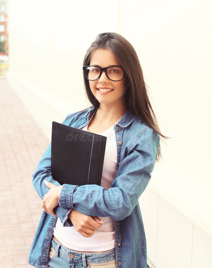 Portrait of Smiling Student Girl in Glasses with Folder Stock Image ...