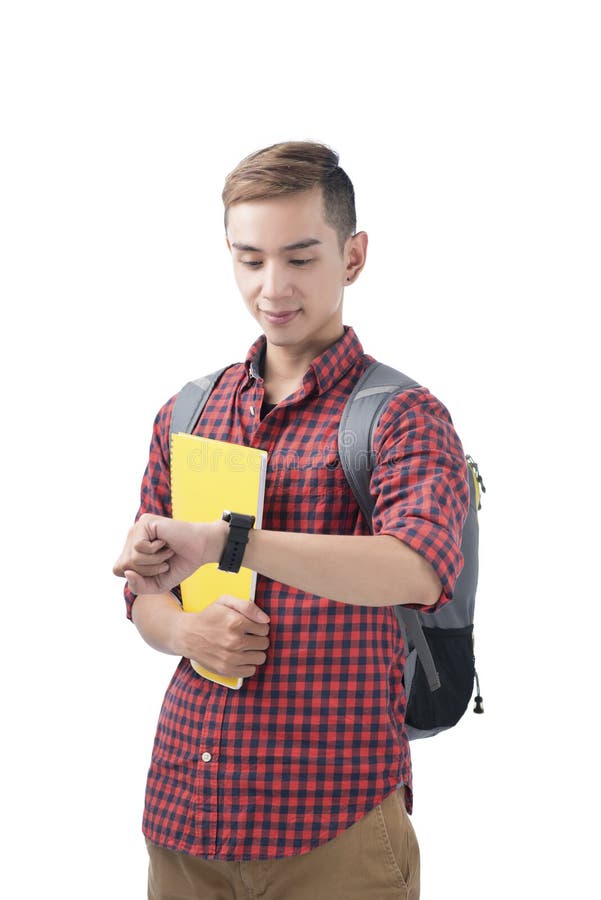 Portrait of a Smiling Student Looking on Wrist Watch Over White Stock ...