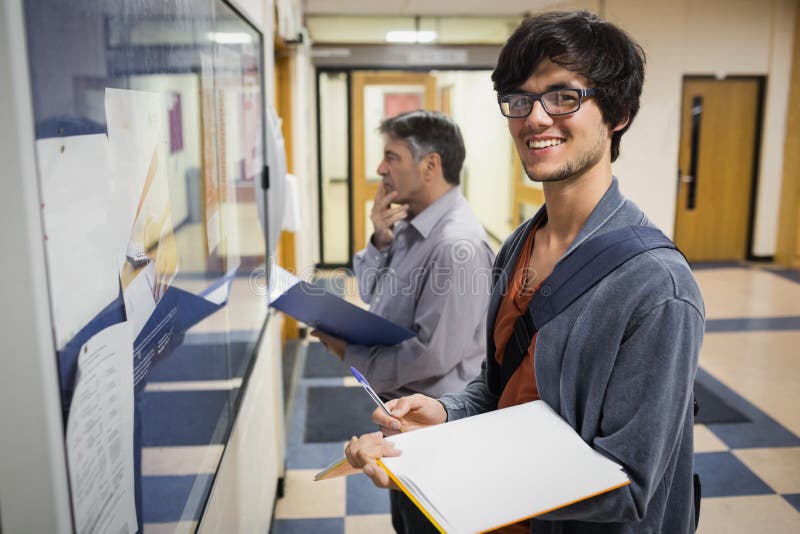 Professor Reading Notice Board Stock Photo - Image of reading, people ...