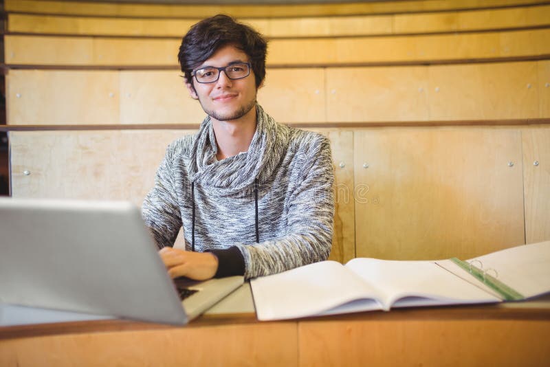 Portrait of Smiling Student Using Laptop in Classroom Stock Image ...