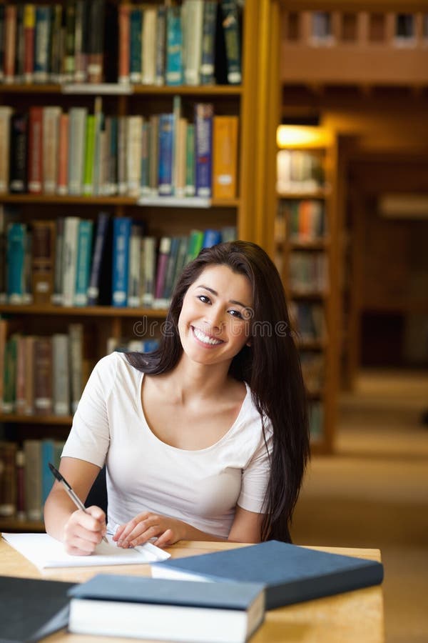 Portrait of a Smiling Student Writing a Paper Stock Image - Image of ...
