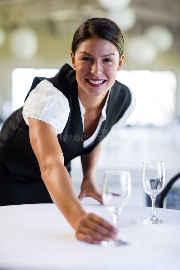 Portrait of Smiling Waitress Setting the Table Stock Image - Image of ...