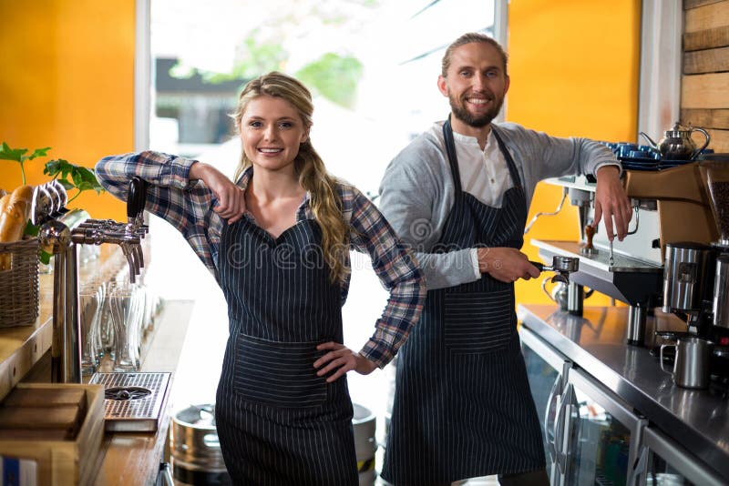 Waiter working at the till stock image. Image of barista - 73243373