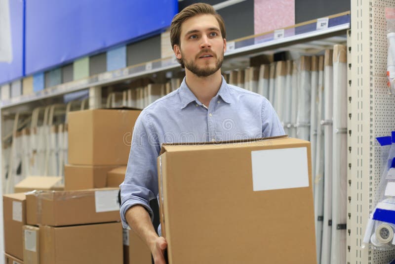 Portrait of a Smiling Warehouse Keeper at Work Stock Photo - Image of ...