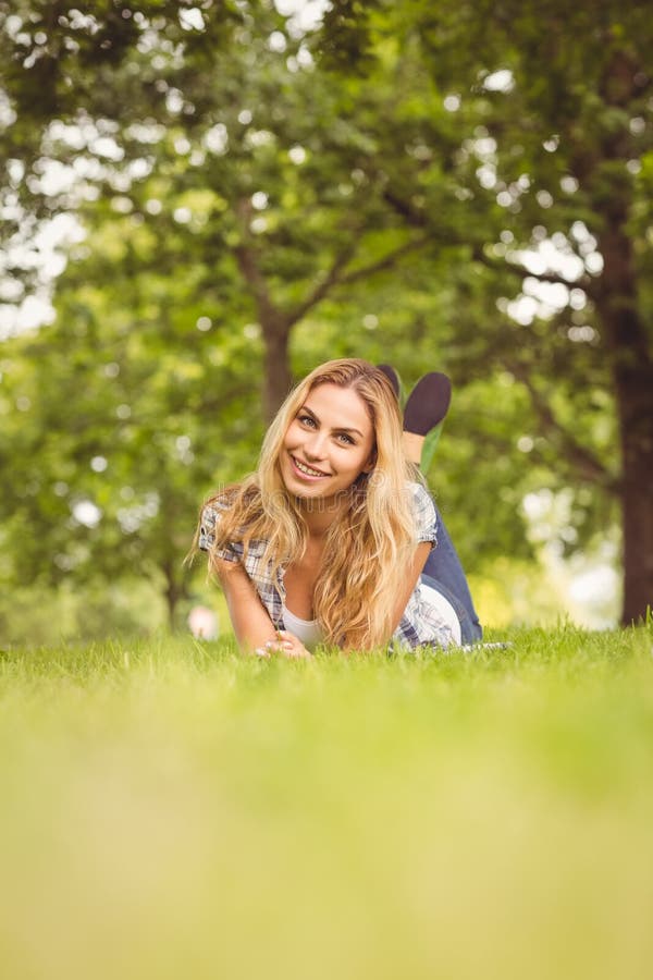 Portrait of Smiling Woman Lying on Front Stock Image - Image of nature ...