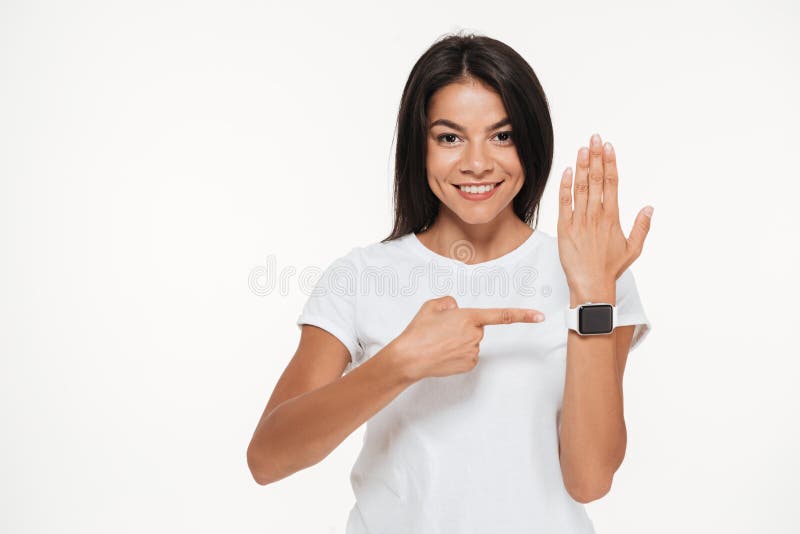 Portrait of a Smiling Woman Pointing Finger at Smart Watch Stock Image ... Portrait of a Smiling Woman Pointing Finger at Smart Watch Stock Image ...