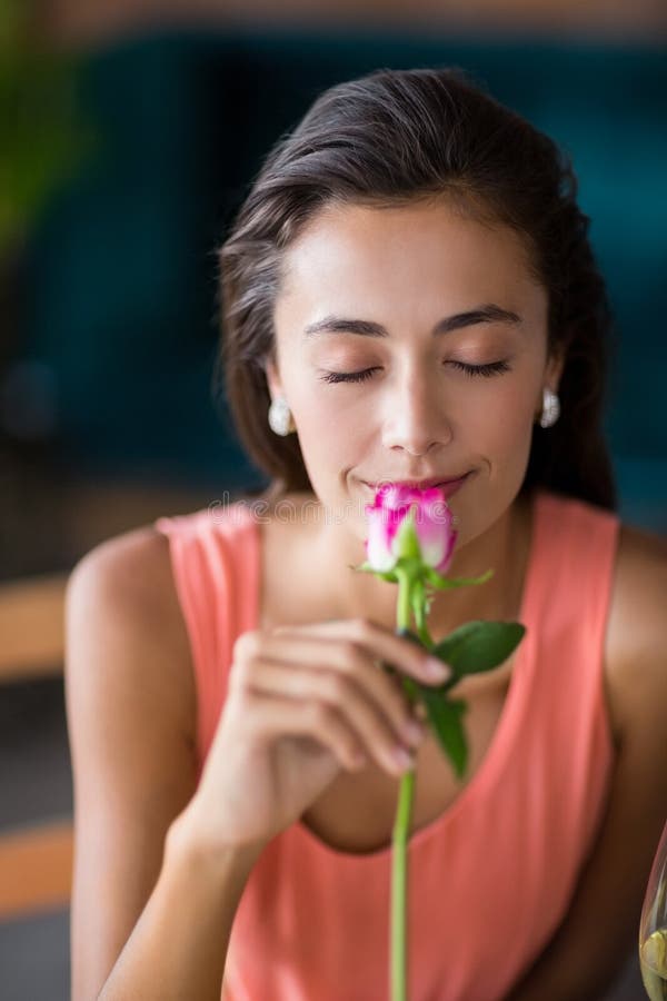 Portrait of Smiling Woman Smelling a Rose Stock Image - Image of ...