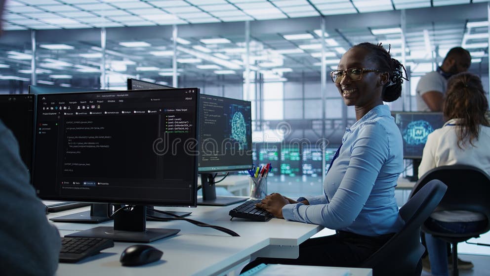 Portrait of Smiling Woman Tasked with Doing Checkup on Server Room ...
