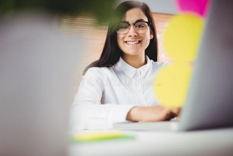 Portrait of Smiling Woman Working in Office Stock Photo - Image of ...