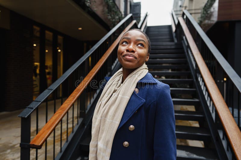 Portrait of Smiling Young Black Woman Standing in the Street Stock ... Portrait of Smiling Young Black Woman Standing in the Street Stock ...