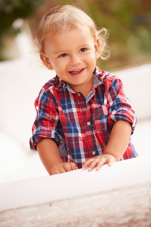 Portrait of Smiling Young Boy Playing Outside Stock Image - Image of ...