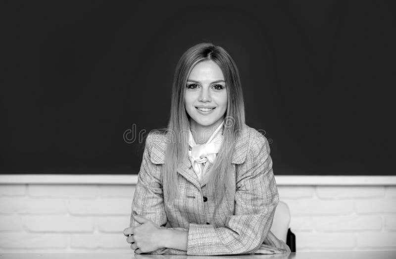 Portrait of Smiling Young College Student Studying in Classroom ...