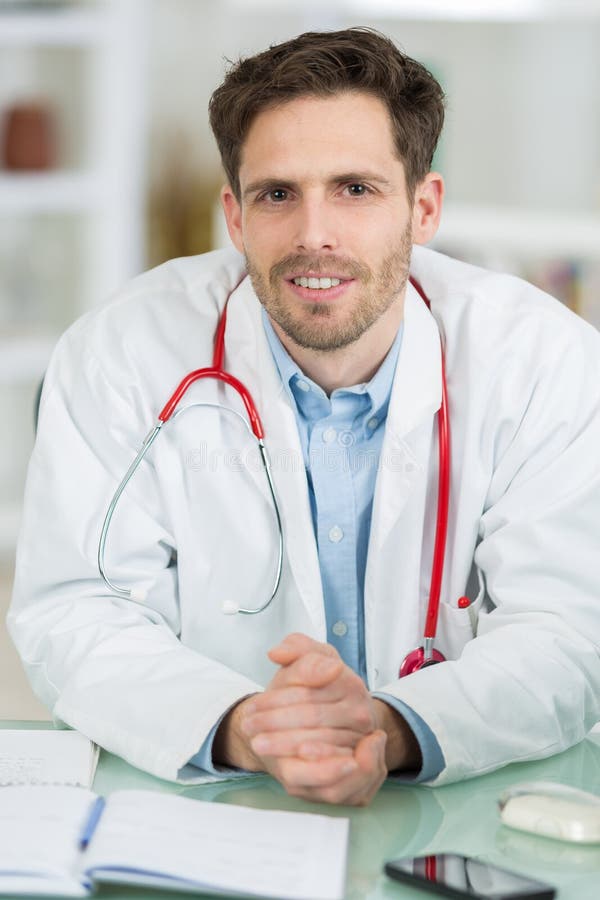 Portrait Smiling Young Male Doctor Stock Photo - Image of smile ...