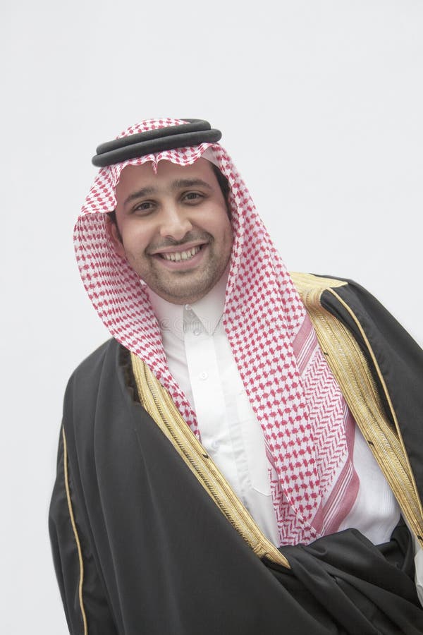 Portrait of Smiling Young Man in Traditional Arab Clothing and Kaffiyeh ... Portrait of Smiling Young Man in Traditional Arab Clothing and Kaffiyeh ...