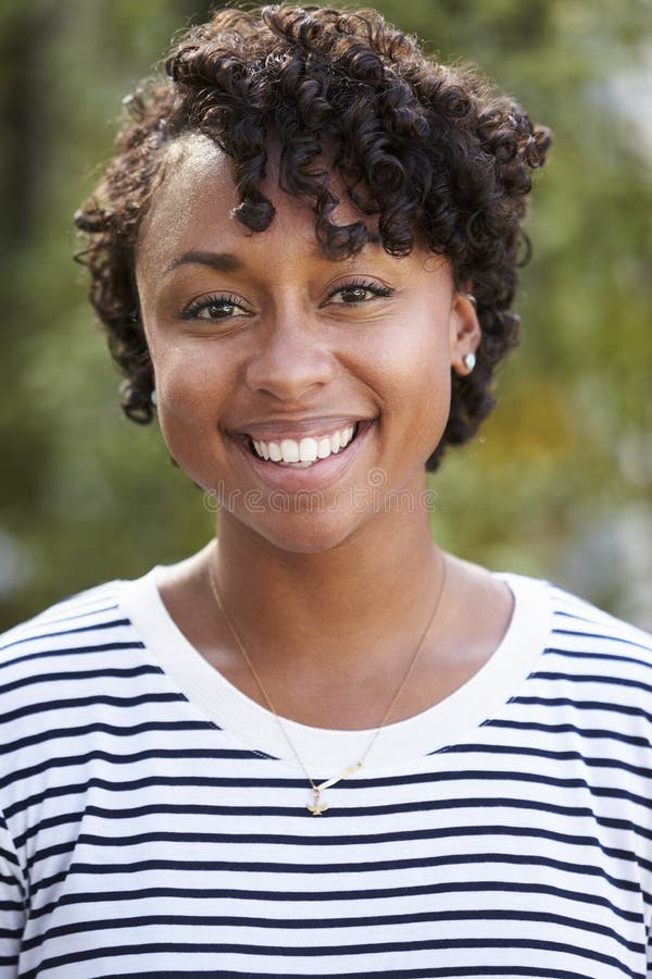 Portrait of Smiling Young Mixed Race Woman, Vertical Stock Photo ...