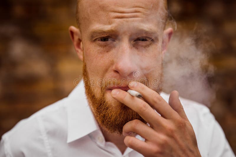 Portrait of Smoking Young Red Hair Man with Beard Stock Image - Image ...