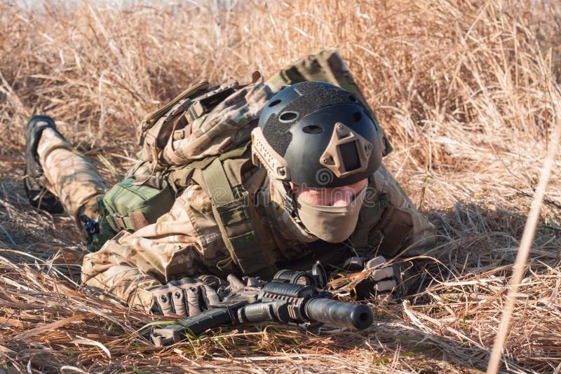 Soldier Crawling Under The Net During Obstacle Course Stock Photo ...