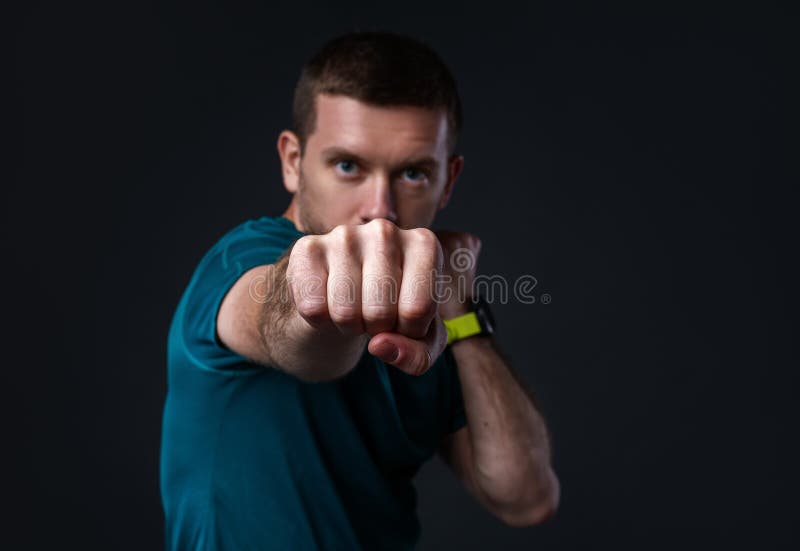 Guy punches the camera stock photo. Image of camera - 158270382