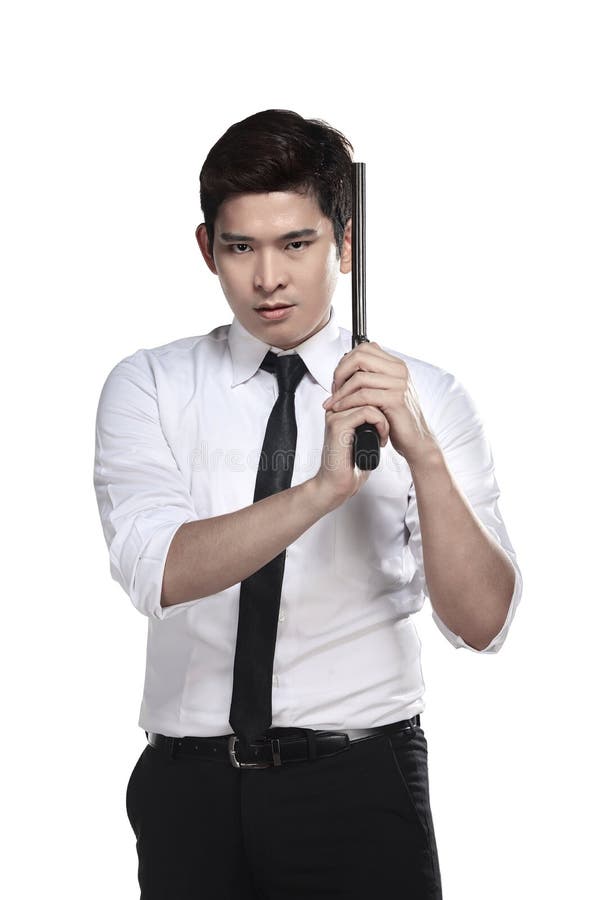 Secret Agent Holding Gun stock image. Image of agent - 64851105