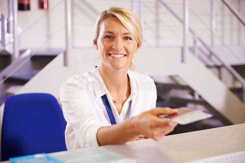 Portrait of Staff at Airport Check in Desk Stock Photo - Image of ...