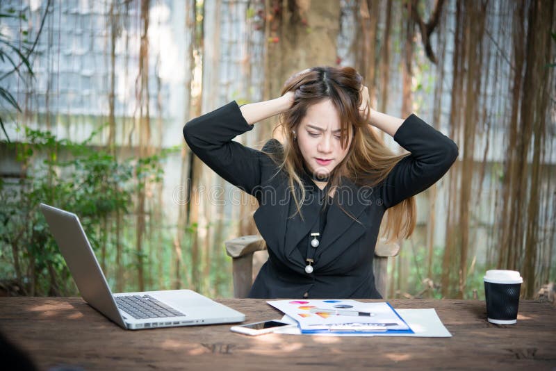 Portrait Of A Stressed Out Business Woman At Her Workplace She Stock