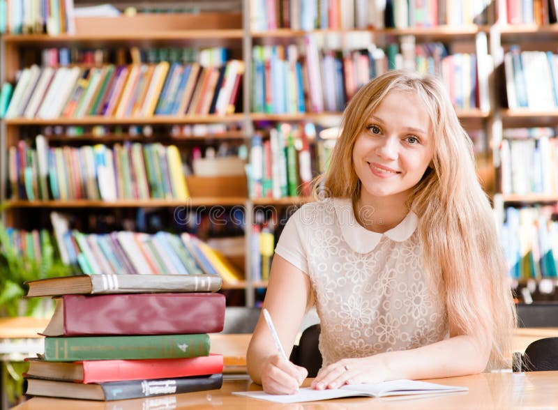 Portrait of a Student Girl Studying at Library Stock Photo - Image of ...