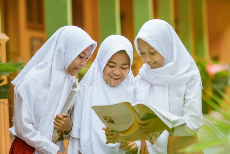 Islamic School Students Studying Together Stock Photo - Image of hijab ...