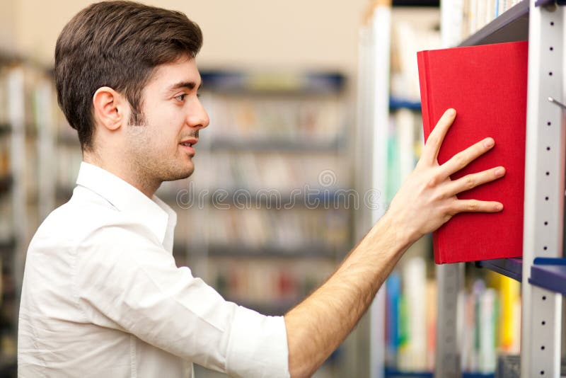 Student taking a book stock image. Image of people, indoor - 29838059