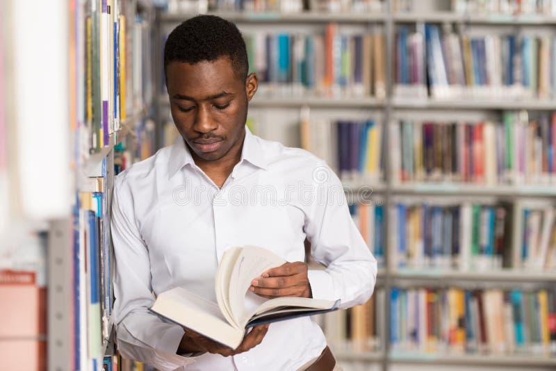 Portrait of a Student in a Library Stock Image - Image of human, adult ...