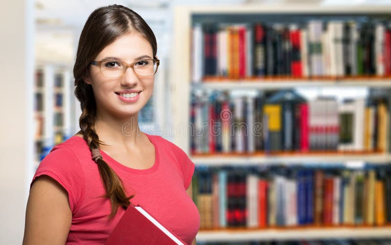 Portrait of a Student in a Library Stock Photo - Image of beautiful ...