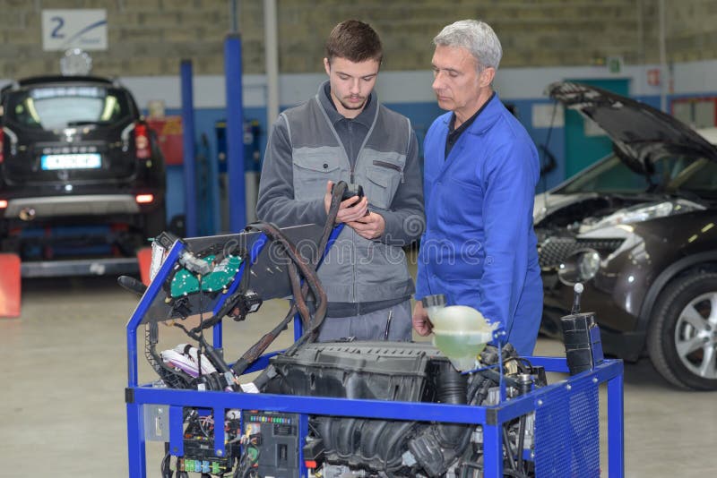 Student with Auto Part Studying Automotive Trade in Vocational School ...