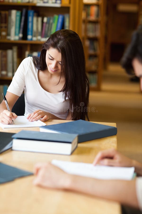 Portrait of a Student Writing a Paper Stock Photo - Image of indoors ...