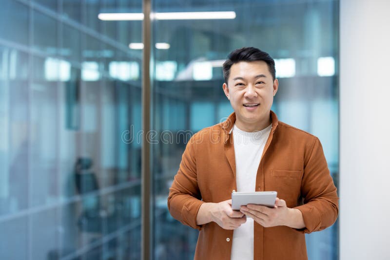 Portrait of Successful Asian Man Inside Office. Businessman Smiling and ...