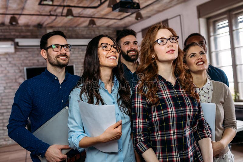 Portrait of Successful Business Team Posing in Office Stock Photo ...