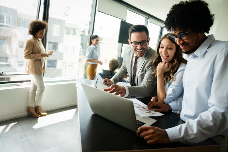 Portrait of Successful Business Team Working in Office Stock Photo ...