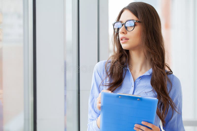 Portrait of a Successful Business Woman Holding Documents. Stock Photo ...