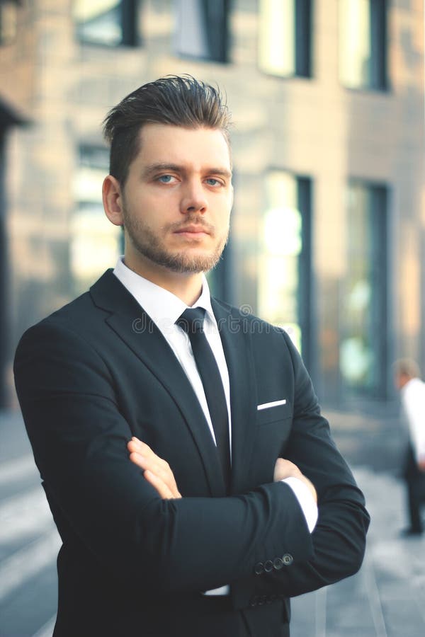 Portrait of a successful businessman on the background of an office ... Portrait of a successful businessman on the background of an office ...