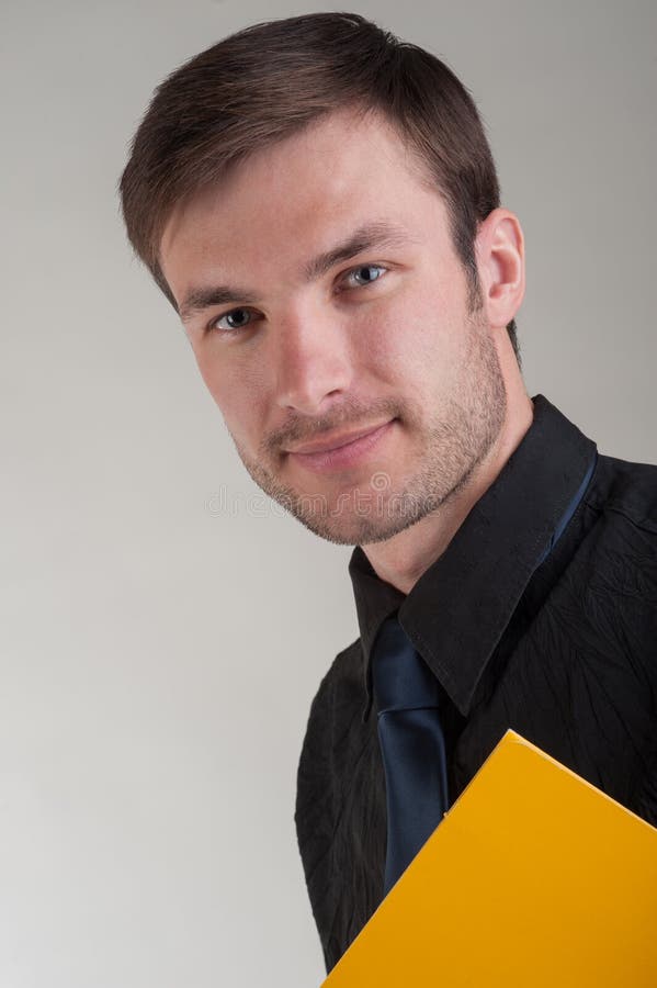 Portrait of a Successful Businessman with a Folder for Yellow Do Stock ...