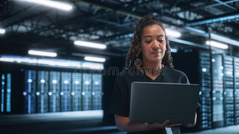Portrait of Successful Female Chief Engineer or CEO Using Laptop ...