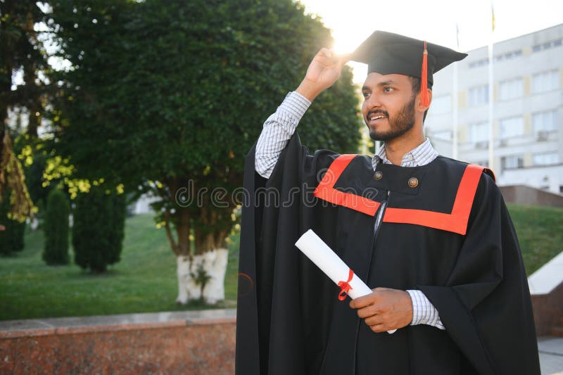Portrait of Successful Indian Student in Graduation Gown. Stock Image ...
