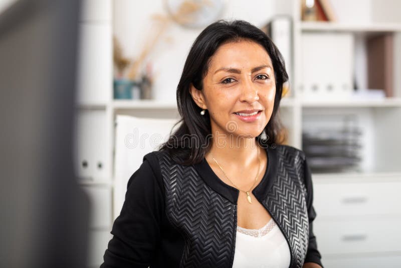 Successful Latin American Business Woman in Office Interior Stock Image ... Successful Latin American Business Woman in Office Interior Stock Image ...