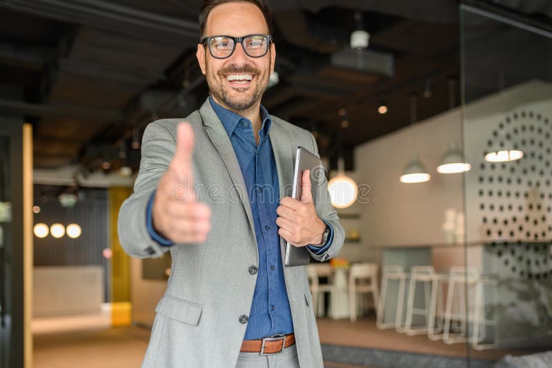 Portrait of Successful Male CEO with Wireless Computer Smiling and ...