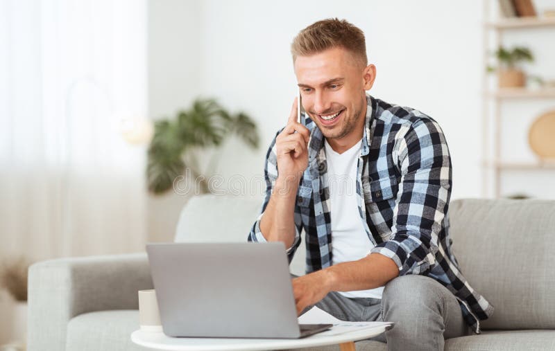 Portrait of Successful Smiling Man Using Pc Talking on Cellphone Stock ...
