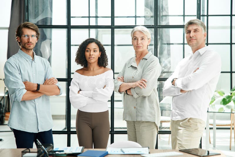 Successful Team of Professionals Standing in the Office. Stock Photo ...
