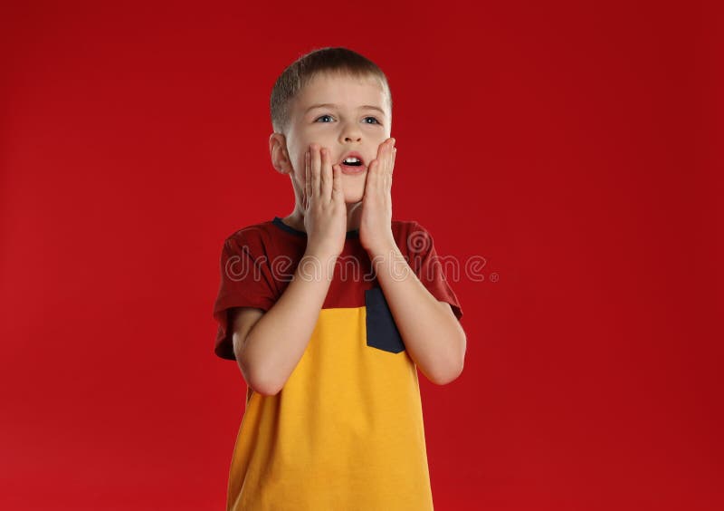 Portrait of Surprised Little Boy on Red Stock Image - Image of ...