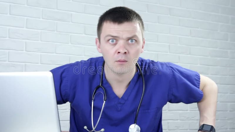 Portrait of Surprised Male Doctor Looking at Camera Stock Footage ...